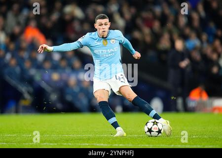 Manchester City's Phil Foden attempts a shot on goal during the Premier ...