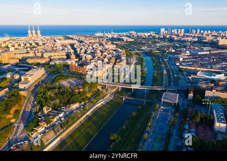 Aerial view of Sant Adria de Besos and Barcelona on Besos river, Spain ...