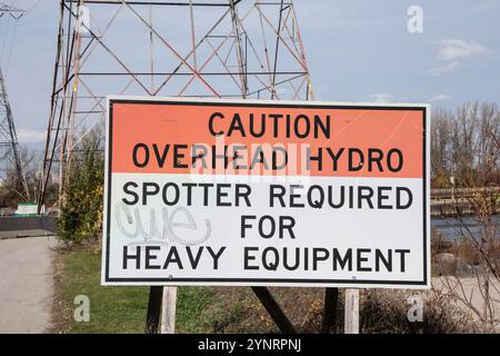 Caution overhead hydro sign at Hamilton Beach Park in Hamilton, Ontario ...