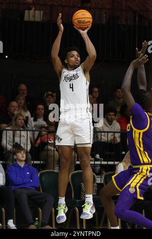 UCF guard Keyshawn Hall shoots during the first half of an NCAA college ...