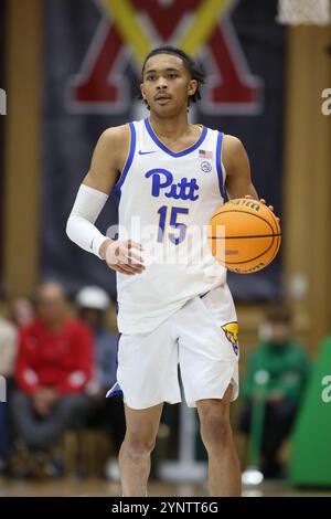 Pittsburgh guard Jaland Lowe (15) drives against Louisville guard Reyne ...