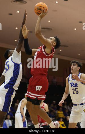 Wisconsin Badgers guard John Tonje (9) handles the ball during a Big ...