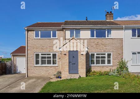 Front elevation of new detached brick house with pitched roof Stock ...
