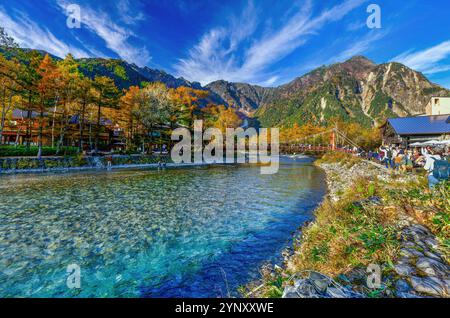 Tourists on the kappa wooden bridge at Kamikochi National park, Nagano ...