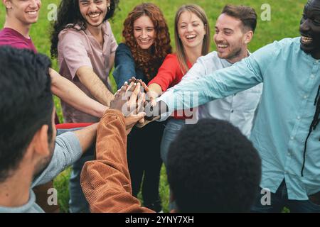 Diverse team demonstrating teamwork and inclusion at a conference ...