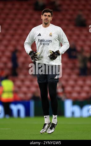 Real Madrid's goalkeeper Thibaut Courtois celebrates after makes a save ...