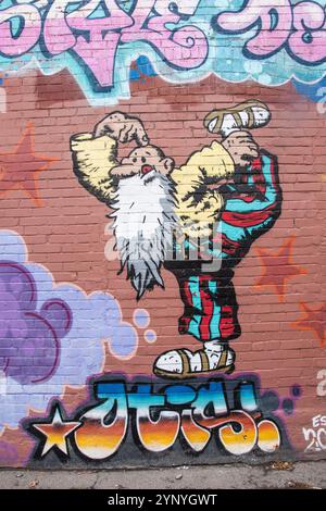 Otis bald white beard man graffiti tagged on a building on Alex ...
