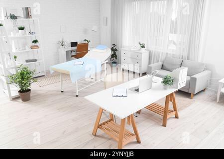 Interior of medical office with desks, couch and sofa Stock Photo - Alamy