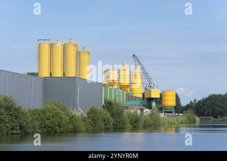 yellow silos belonging to a cement factory in the netherlands Stock ...