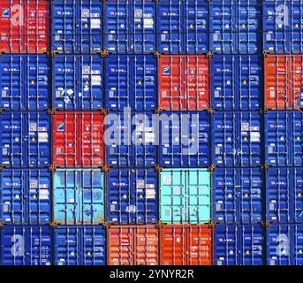 Piled up cargo containers in the Rotterdam harbor area Stock Photo - Alamy
