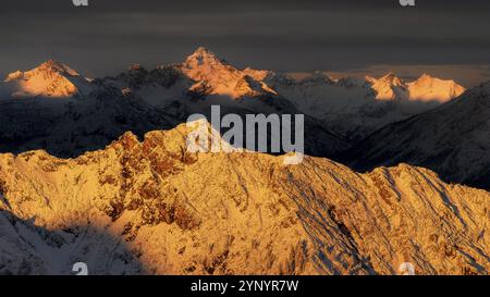 Mountains around Plansee in Reutte Tyrol in winter with snow at sunrise ...
