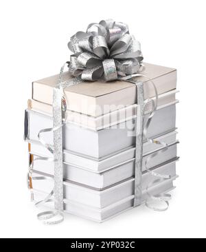Stack of books with silver bow as gift isolated on white Stock Photo ...