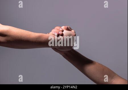 Two hands, helping arm of a friend, teamwork. Helping hand concept and ...