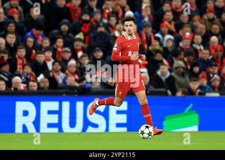 Liverpool's Curtis Jones runs with the ball away from Porto's Fabio ...