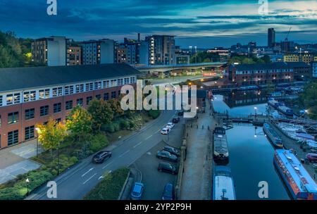 Aerial view of Victoria Quays and Sheffield city skyline at dusk ...