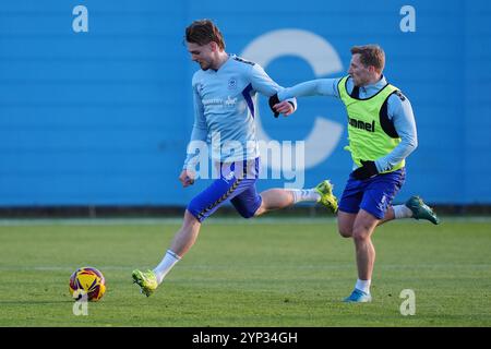 Coventry City's Jack Rudoni (left) and Preston North End's Ryan Ledson ...