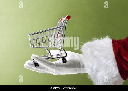 Hand holding a Cart on a white background Stock Photo - Alamy