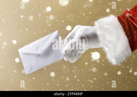 Santa Claus with blank letter on color background Stock Photo - Alamy