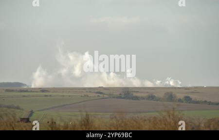 white smoke billows from artillery shell impacts Stock Photo - Alamy