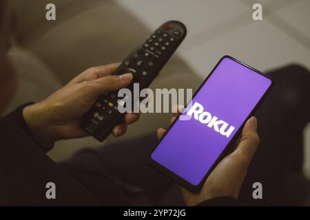 In this photo illustration, a Roku logo seen displayed on a smartphone ...