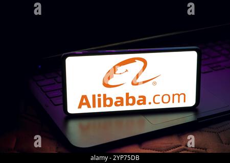 In this photo illustration, the Alibaba company logo is seen displayed ...