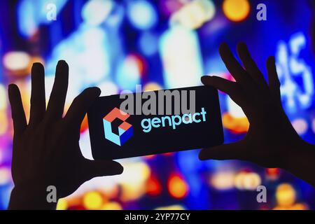 In this photo illustration, Genpact logo is seen on a smartphone screen ...