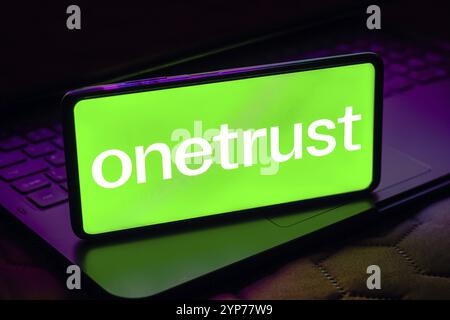 In this photo illustration, the OneTrust (One Trust) logo is seen ...
