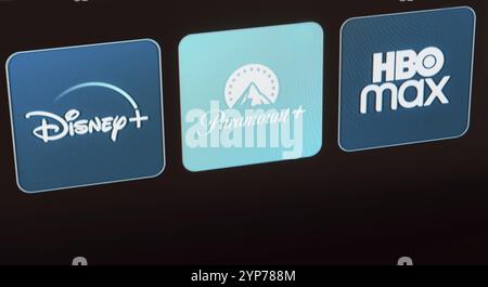 In this photo illustration, the Disney Plus logo is displayed on a ...