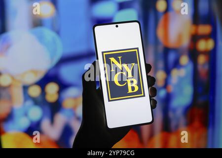 In this photo illustration, the Community Bank logo is seen displayed ...