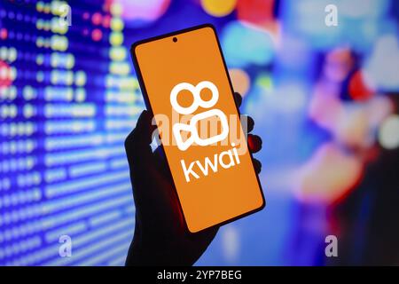 In this photo illustration, the Kwai logo is seen displayed on a ...