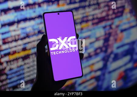 In this photo illustration, the DXC Technology Company logo is ...