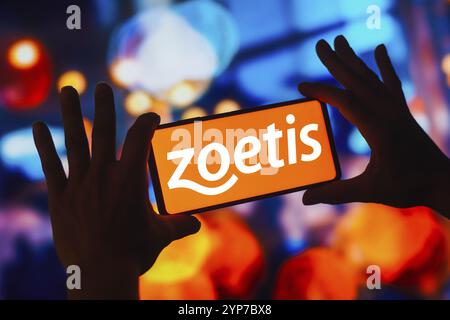 In this photo illustration, the Zoetis company logo is seen displayed ...