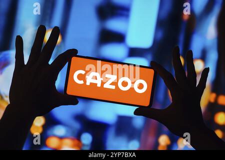In this photo illustration, the Cazoo logo is displayed on a smartphone ...
