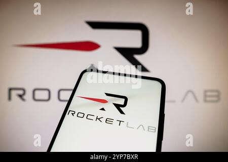In this photo illustration, a Rocket Lab logo is seen displayed on a ...