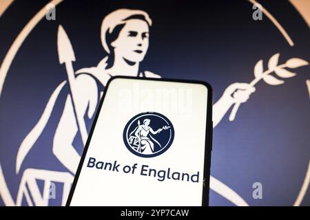 In this photo illustration, the Bank of England (BoE) logo is displayed ...