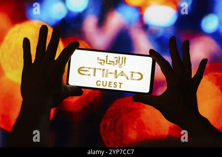 In this photo illustration, the Etihad Guest (Etihad Airways) logo seen ...