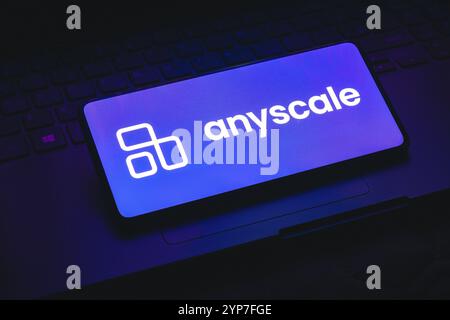 In this photo illustration, the Anyscale logo is displayed on a ...