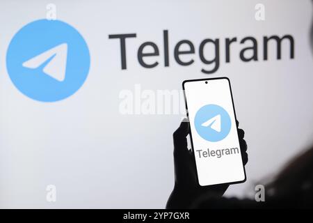 In this photo illustration, the Telegram logo is displayed on a ...