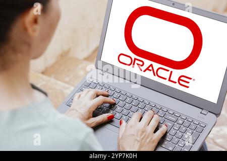 In this photo illustration, an Oracle logo is seen displayed on the ...
