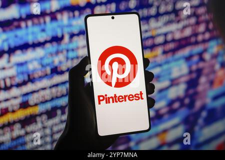In this photo illustration, the Pinterest logo is displayed on a ...