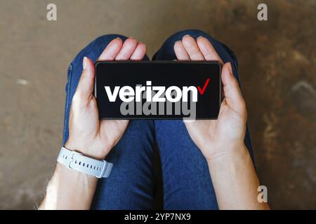In this photo illustration, a Verizon Communications Inc. logo seen ...