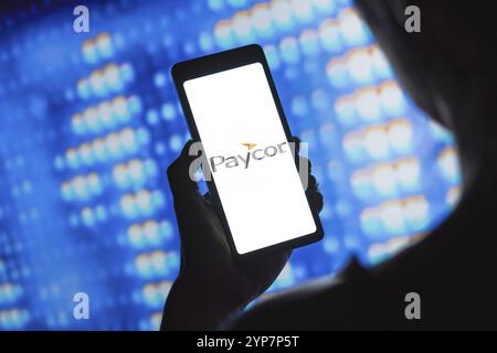 In this photo illustration, the Paycor HCM, Inc. logo is displayed on a ...