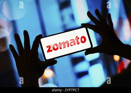 In this photo illustration, the Zomato logo seen displayed on a ...
