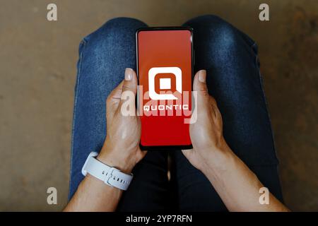 In this photo illustration, the Quontic Bank logo is displayed on a ...