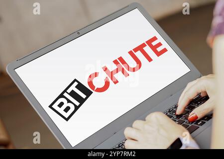 In this photo illustration, the BitChute logo is displayed on a laptop ...