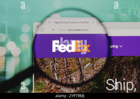 In this photo illustration, the homepage of the FedEx website seen on a ...
