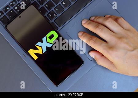 An NXP Semiconductors logo on the screen at a keynote at Computex 2026 ...