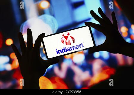 In this photo illustration, the IndiaMART logo seen displayed on a ...