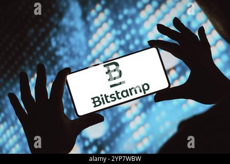In this photo illustration, the Bitstamp logo is seen displayed on a ...