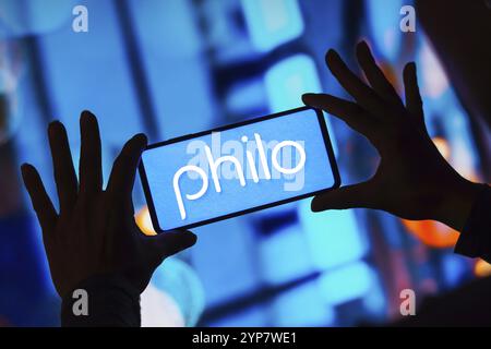 In this photo illustration, the Philo logo is displayed on a smartphone ...